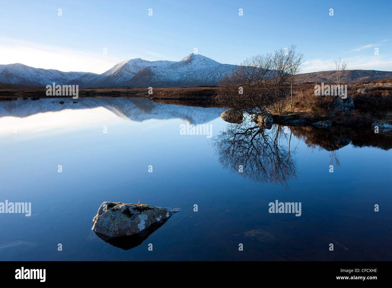 Black Mount Hills and their reflection in the flat calm Lochain na h ...