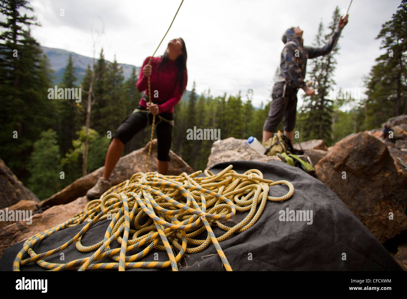 climbers belaying at Lost Boys crag, Jasper National Park, Alberta ...