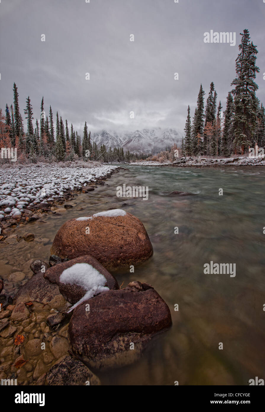 The Wheaton River continues to run with the snow coating the rocks ...