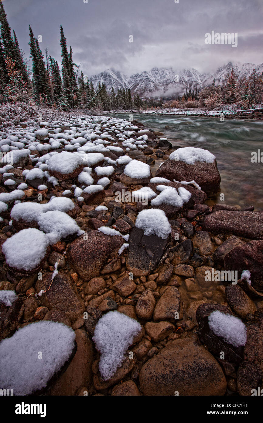 The Wheaton River continues to run with the snow coating the rocks ...