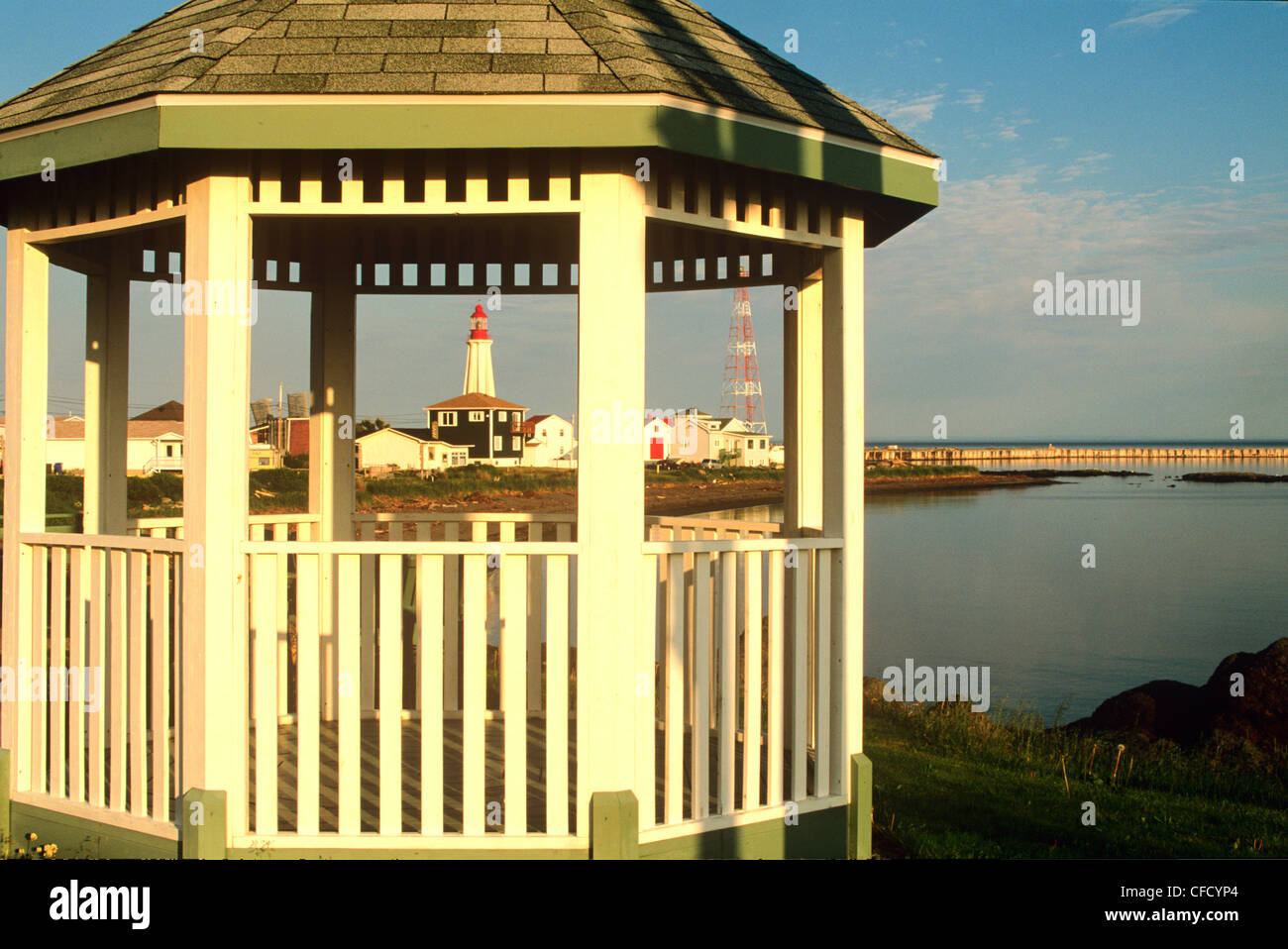 Point-au-Pere Lighthouse viewed through Gazebo at sunrise, Quebec ...