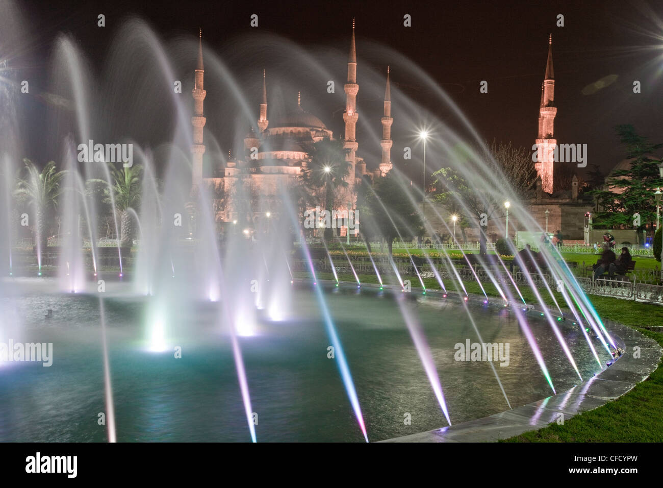Coloured fountains at night in Sultan Ahmet Park, Istanbul, Turkey ...