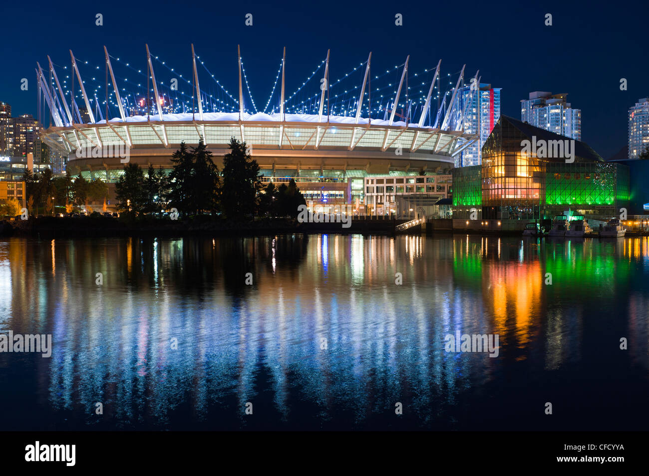 City skyline with new retractable roof on BC Place Stadium, False Creek ...