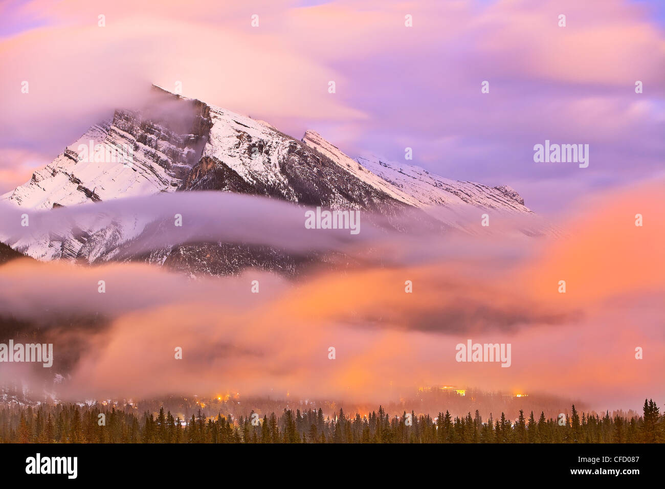 Mount Rundle, Banff townsite at dusk and dramatic clouds. Banff ...