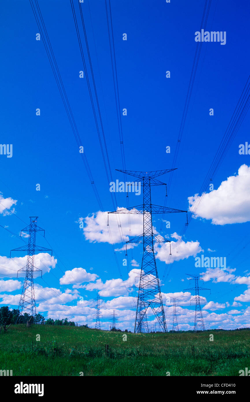 Hydro transmission towers - cumulus cloud background, British Columbia ...