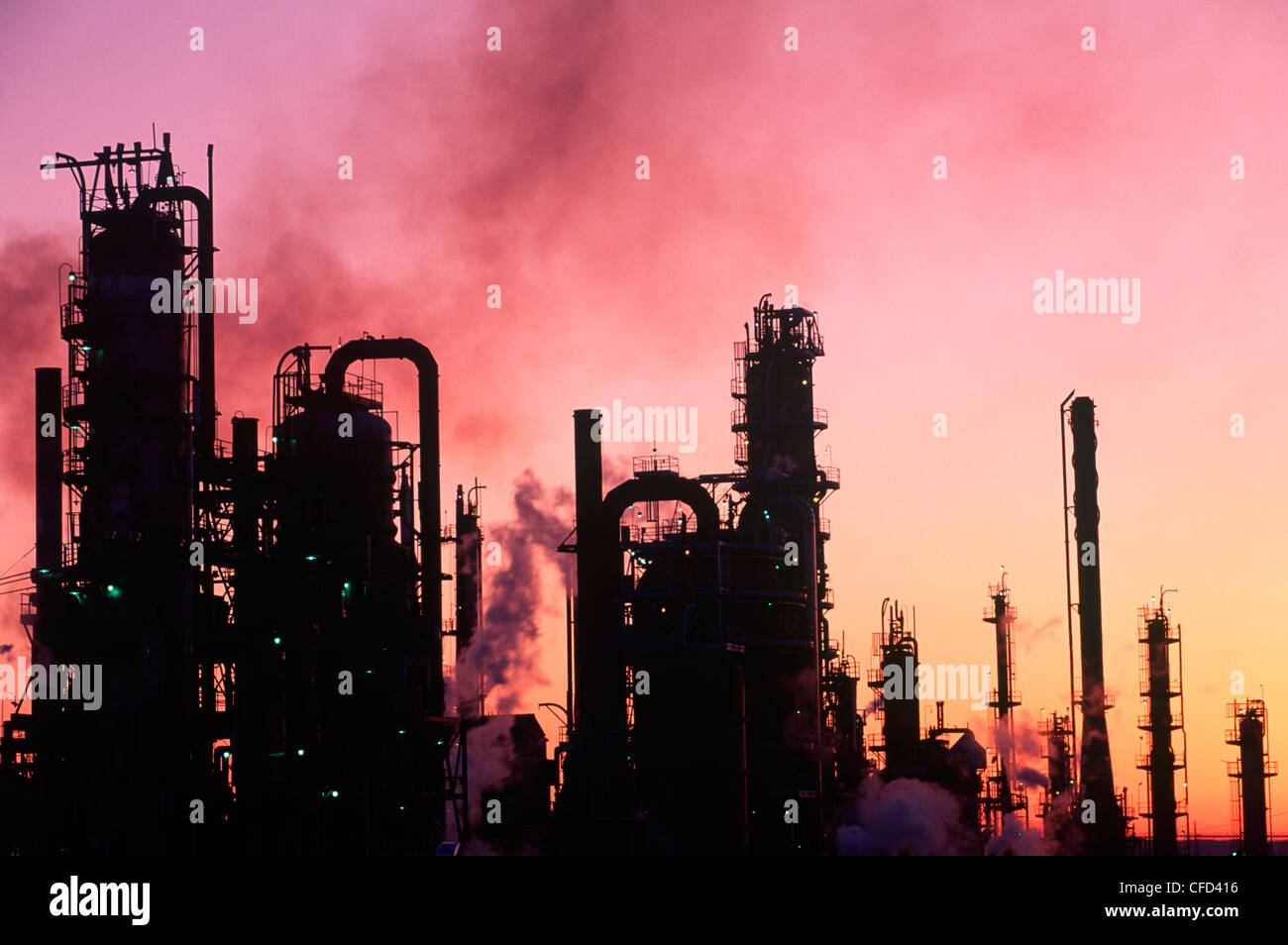 Petrochemical refinery at sunrise - Towers sillouette, British Columbia ...