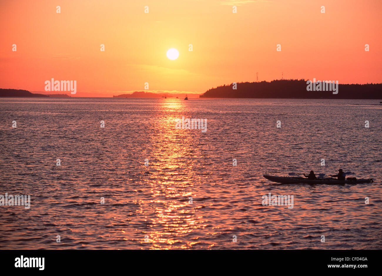 Johnstone Strait, kayakers at sunset, Vancouver Island, British ...