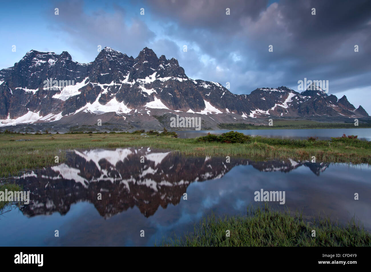 Early morning reflection of the Ramparts and Amethyst Lake, Tonquin ...