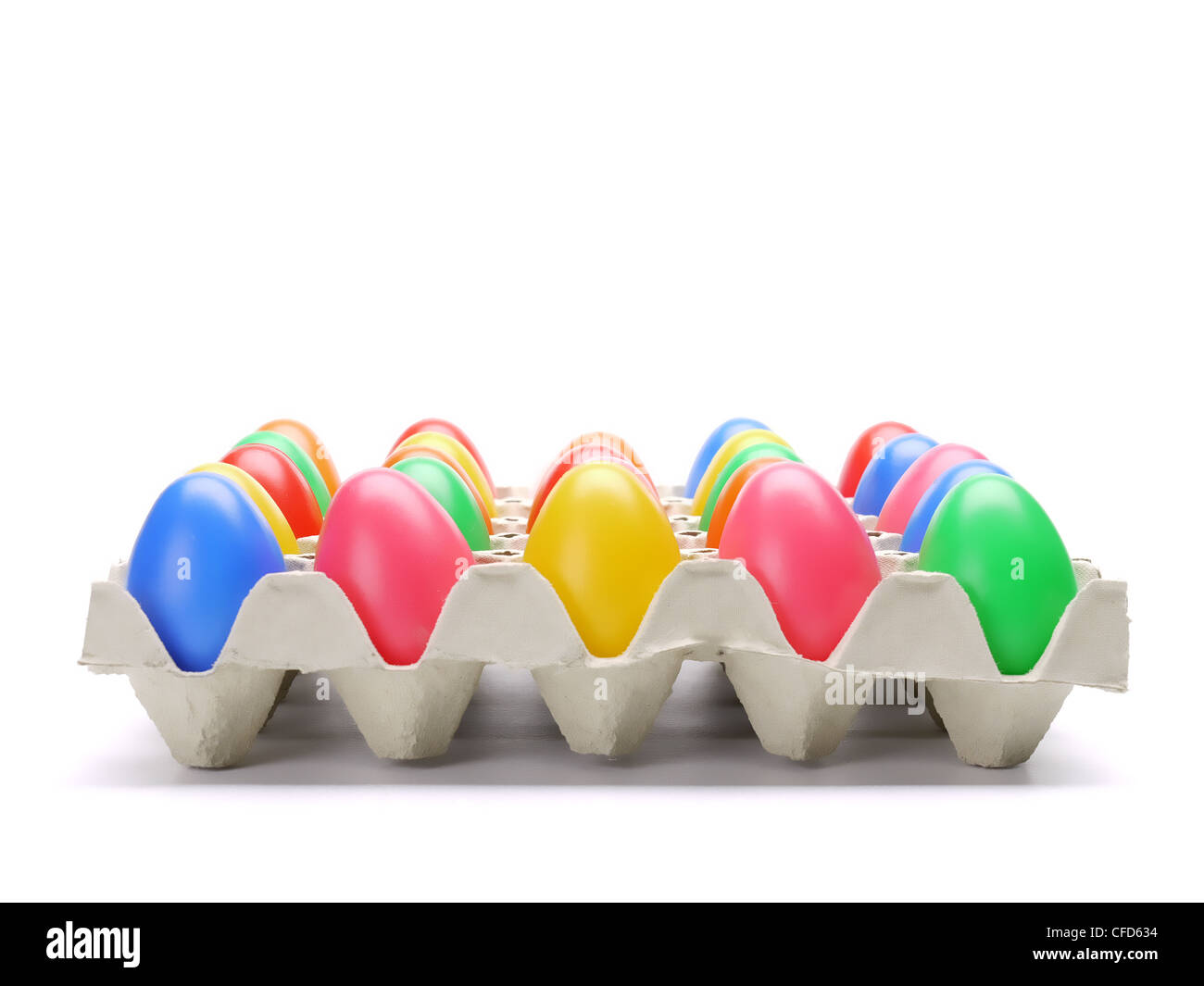 Colorful easter eggs in paper box shot over white background Stock ...