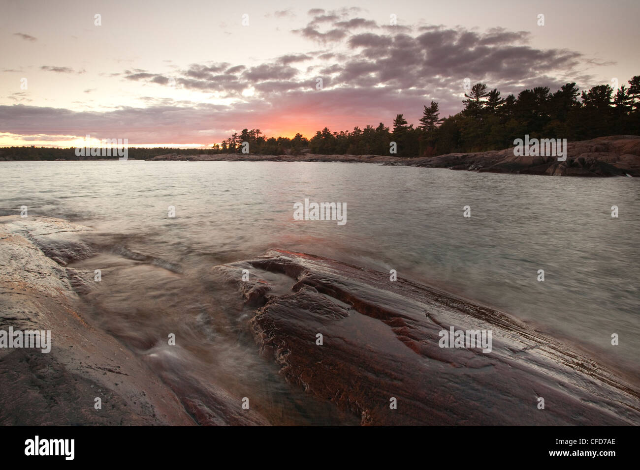 Sunset on shore of Georgian Bay at Killarney Provincial Park, Ontario ...
