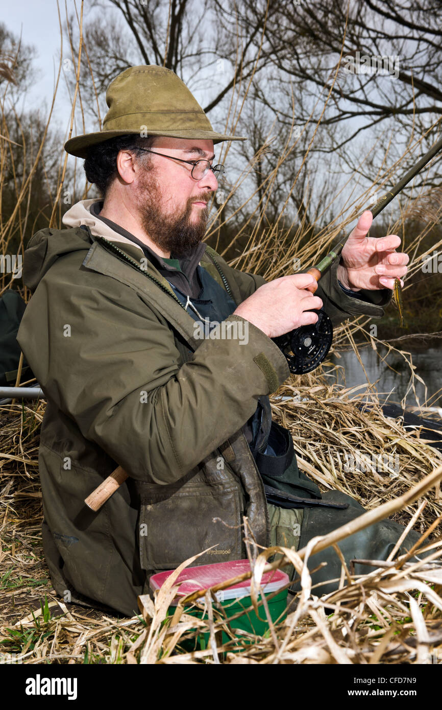 Angling fishing fisherman angler hi-res stock photography and images ...