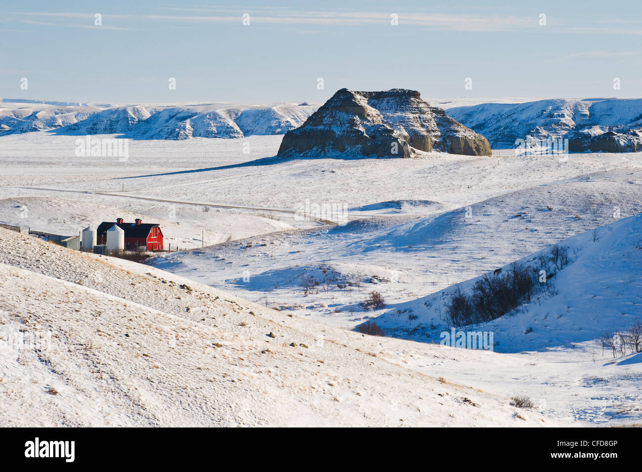 Big Muddy Badlands with Castle Butte and red barn, Saskatchewan, Canada ...