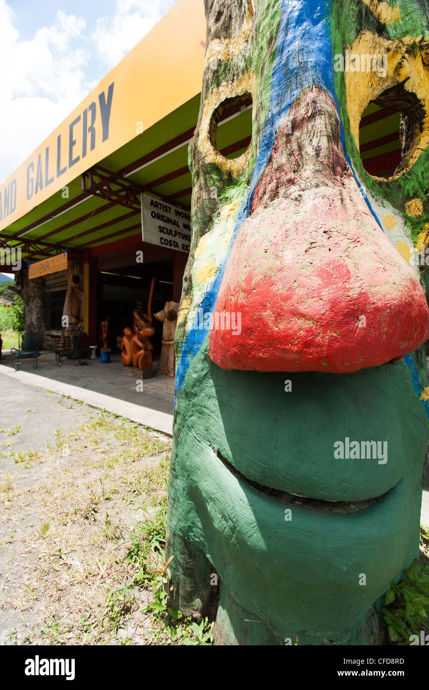 A large wooden statue displayed outside Gallery Original famous for ...