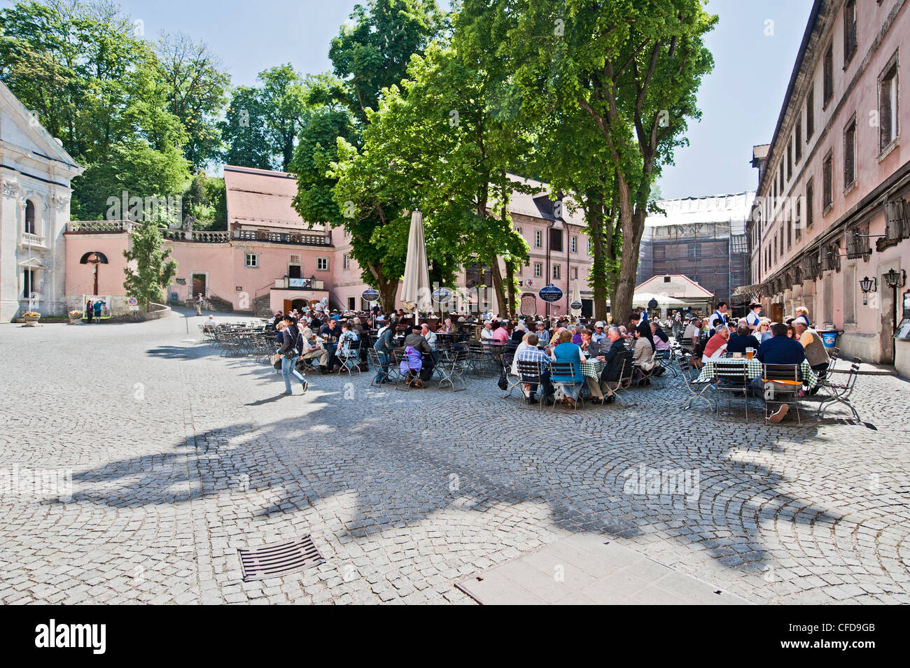 People at outdoor seating of the restaurant of Weltenburg monastery ...