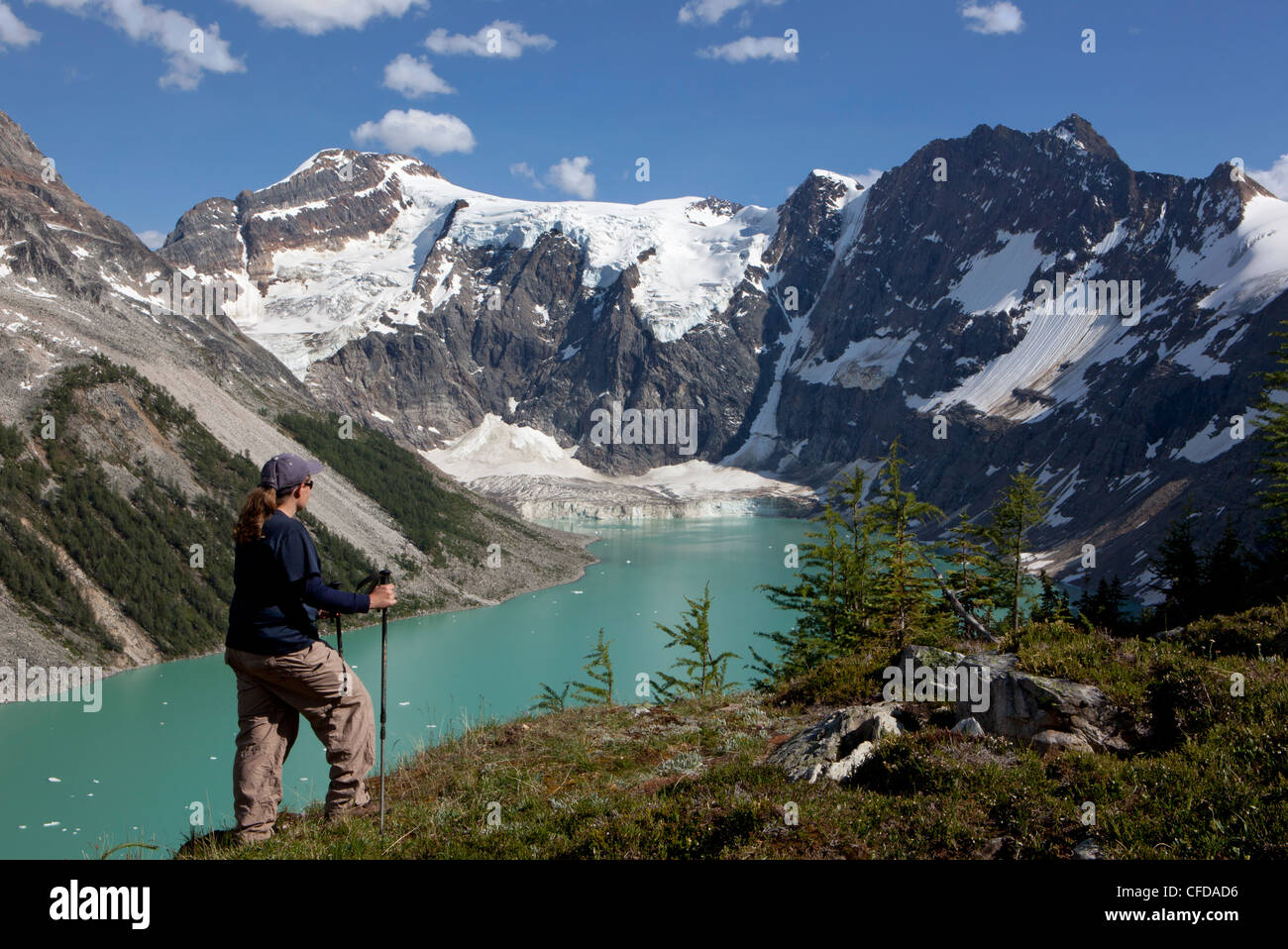 Hiker High Above Lake of the Hanging Glacier, Purcell Mountains ...