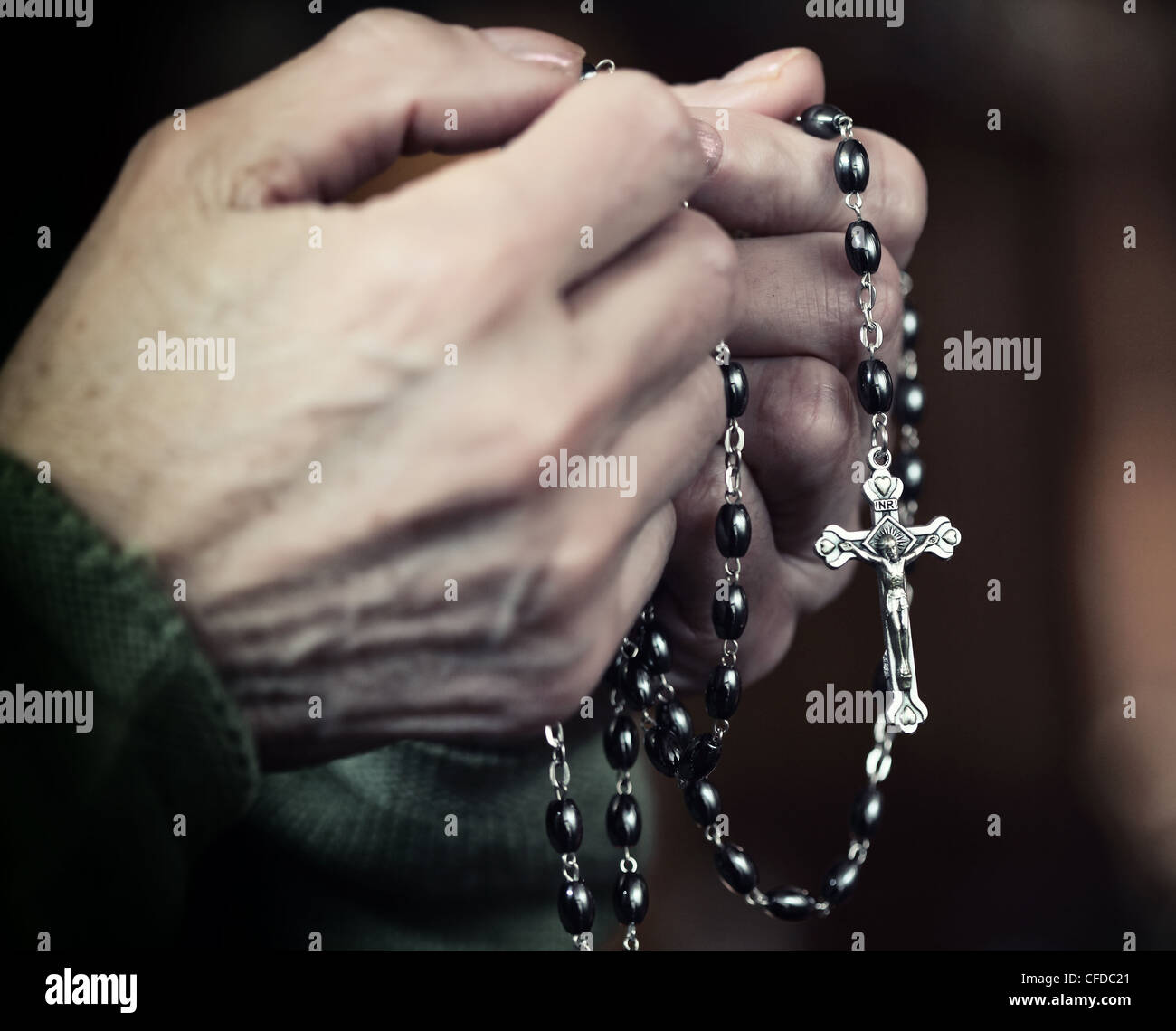 Prayer hands rosary hi-res stock photography and images - Alamy