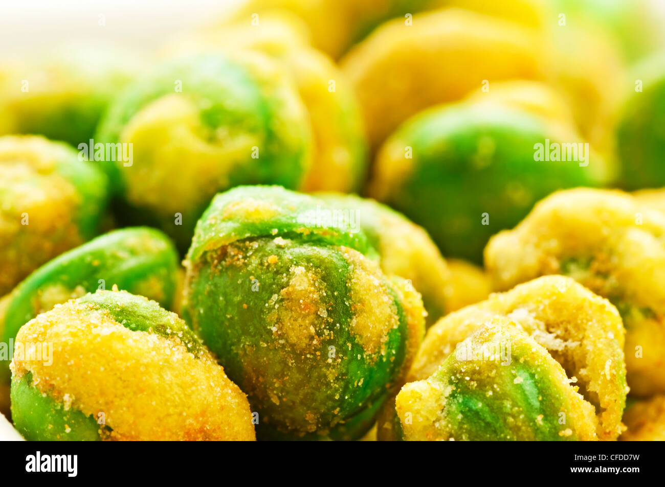 wasabi coated green peas Stock Photo - Alamy