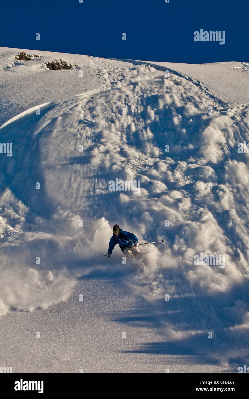 Skier Descending A Steep Slope High Resolution Stock Photography and ...