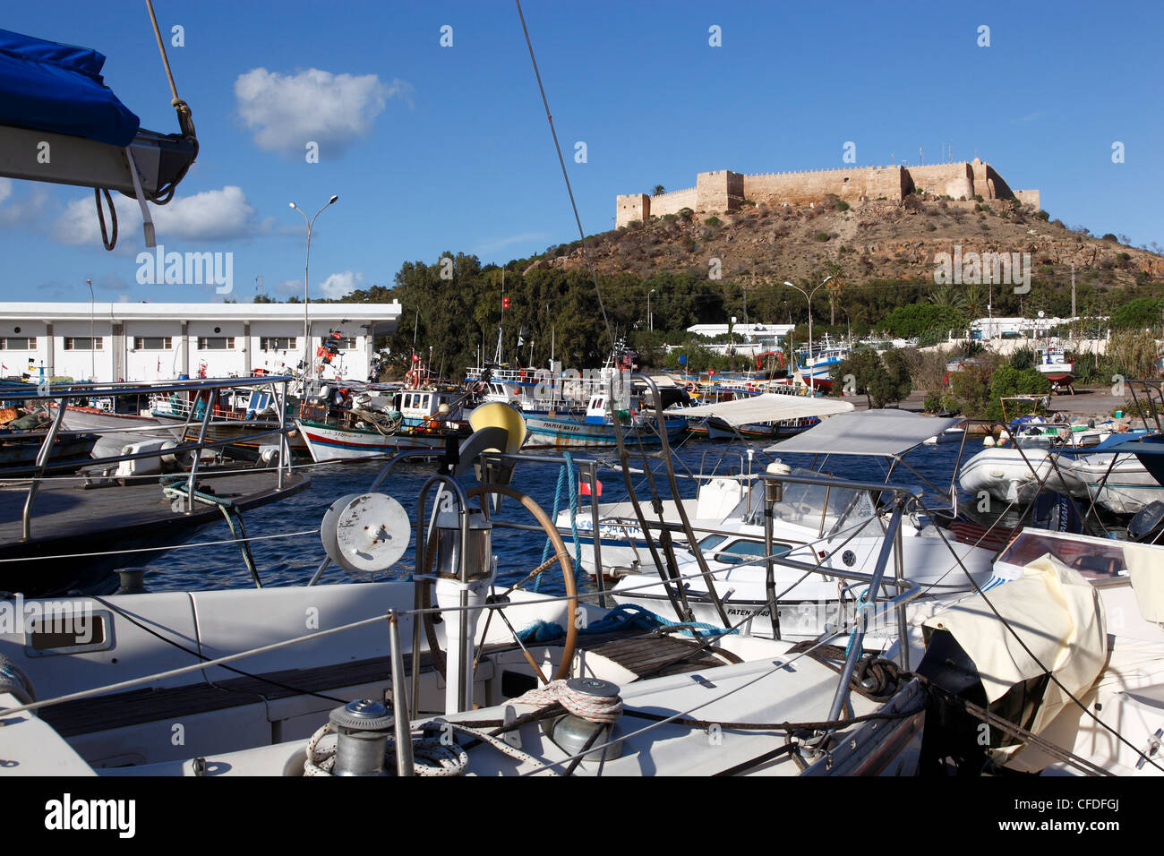 Fishing boats in the harbour and the 6th century Byzantine Fortress in ...