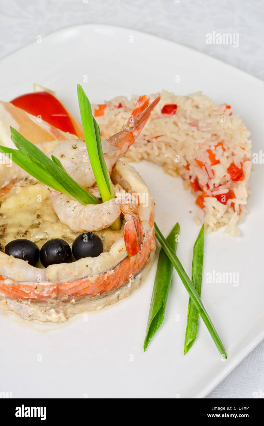 tasty prepared fish with rice and vegetables Stock Photo - Alamy