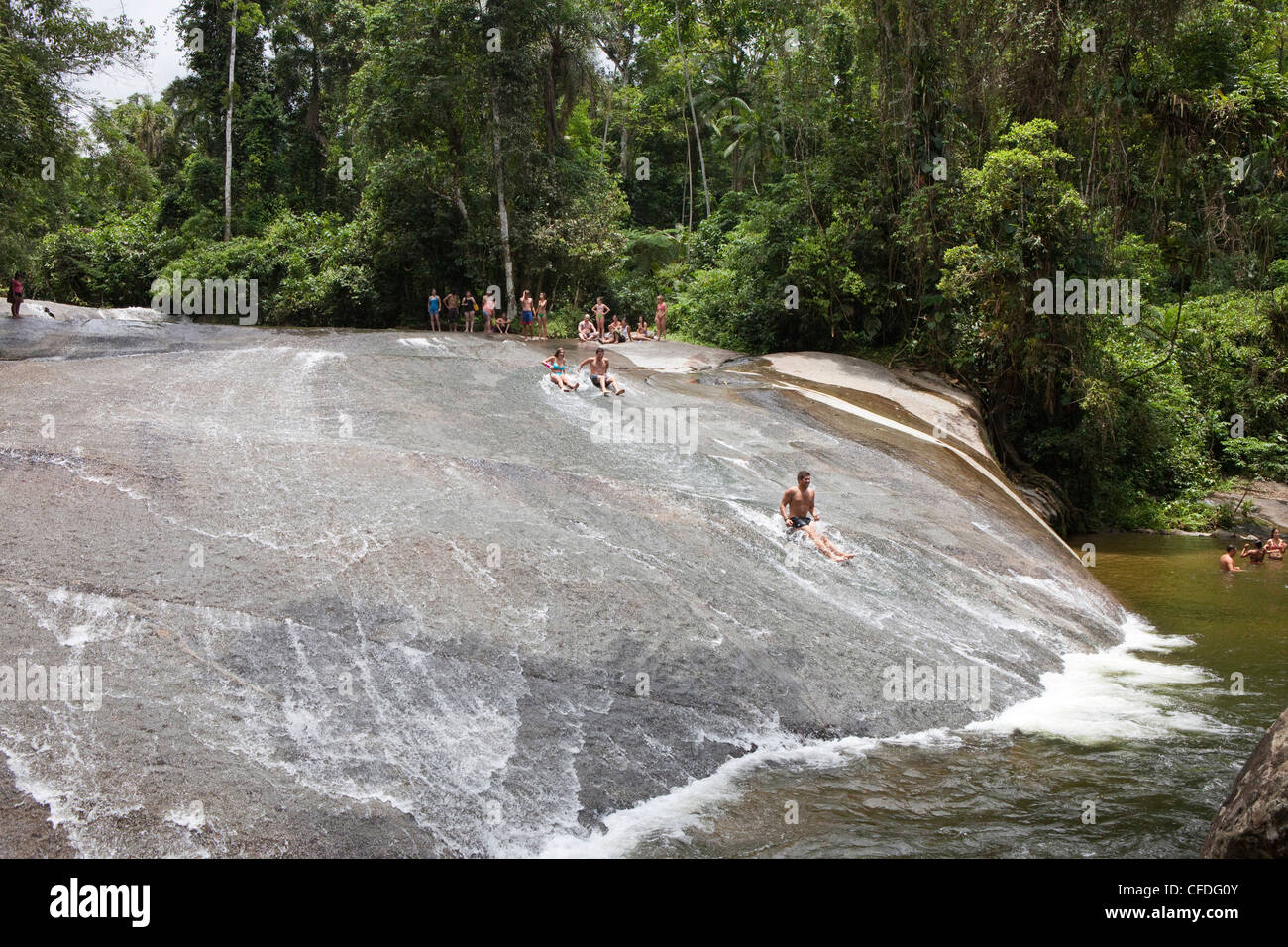 People bathing in a waterfall near the colonial town Paraty, Costa ...