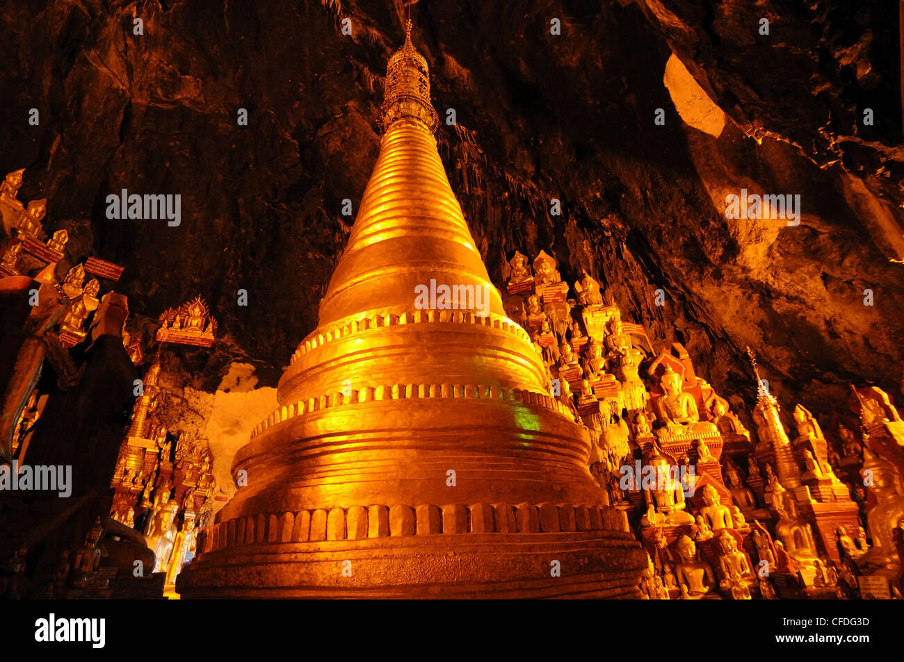 Golden Buddhist statues in the limestone caves of Pindaya, Myanmar ...