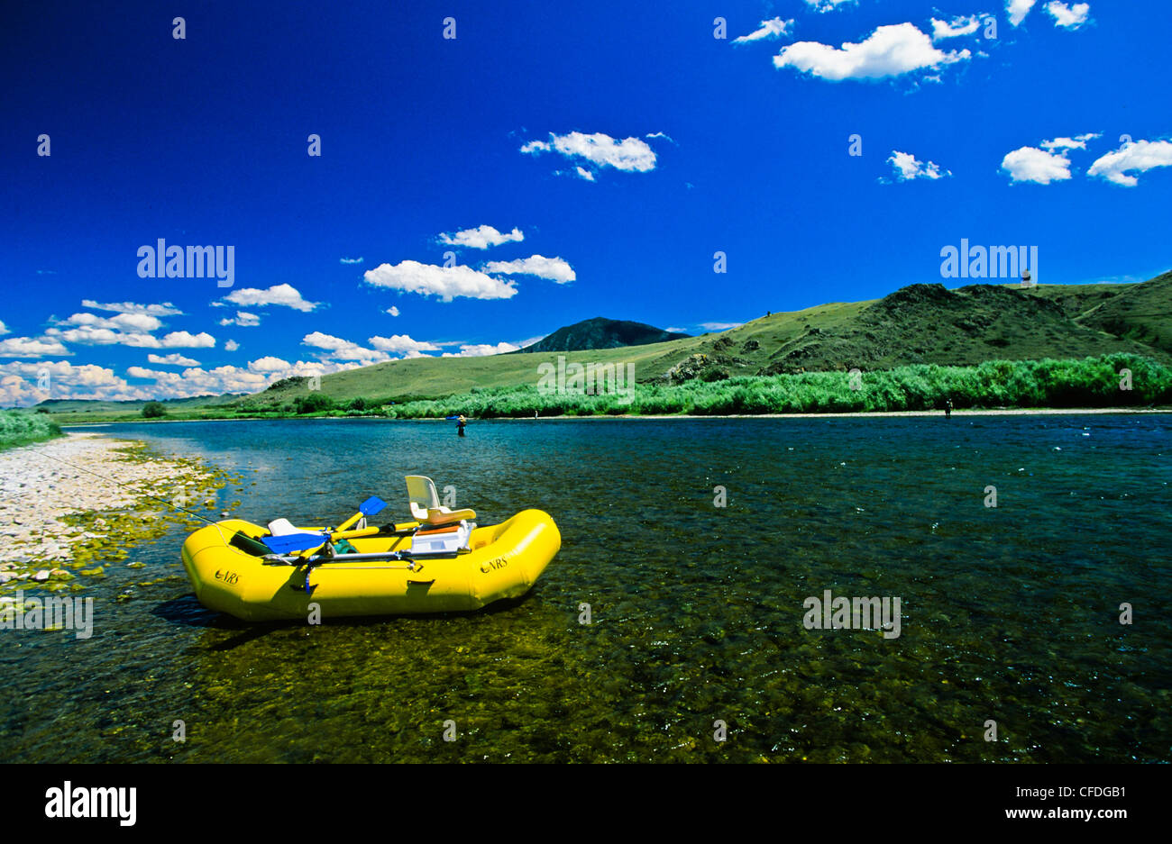 Man fly fishing with raft, Missouri River, Montana, United States of ...