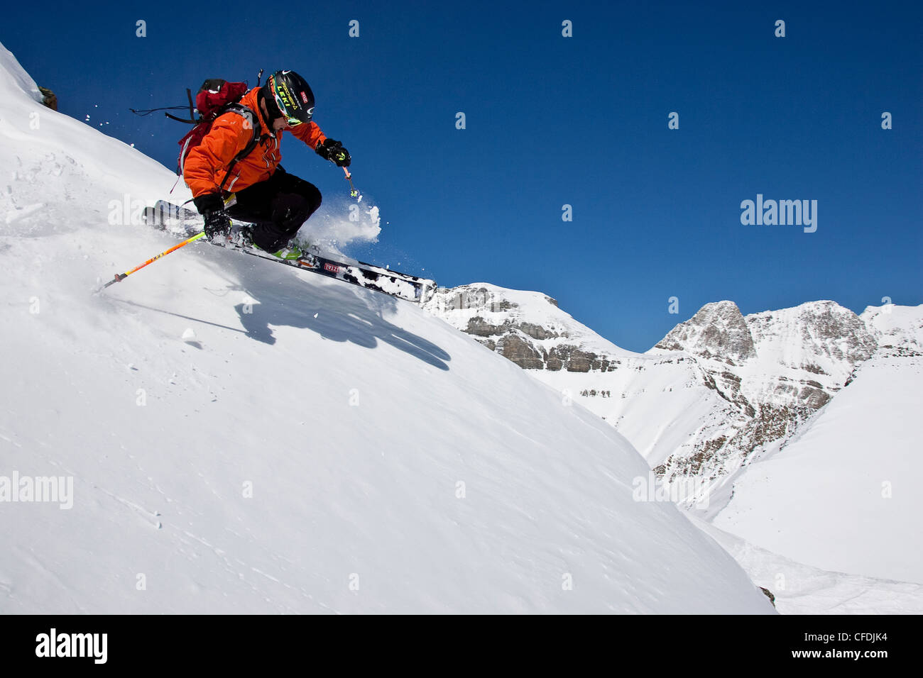 Young man skiing powder at Lake Louise Ski Area, Banff National Park ...