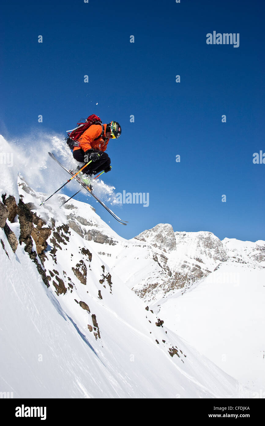 Young man skiing powder at Lake Louise Ski Area, Banff National Park ...