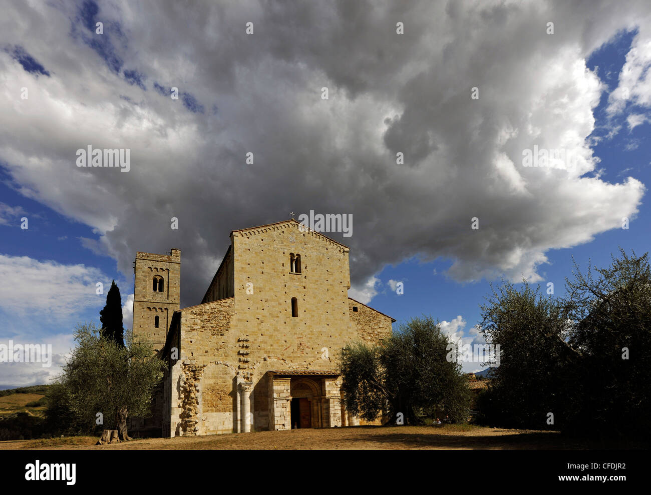 St. Antimo Abbey under clouded sky, Province of Siena, Tuscany, Italy ...
