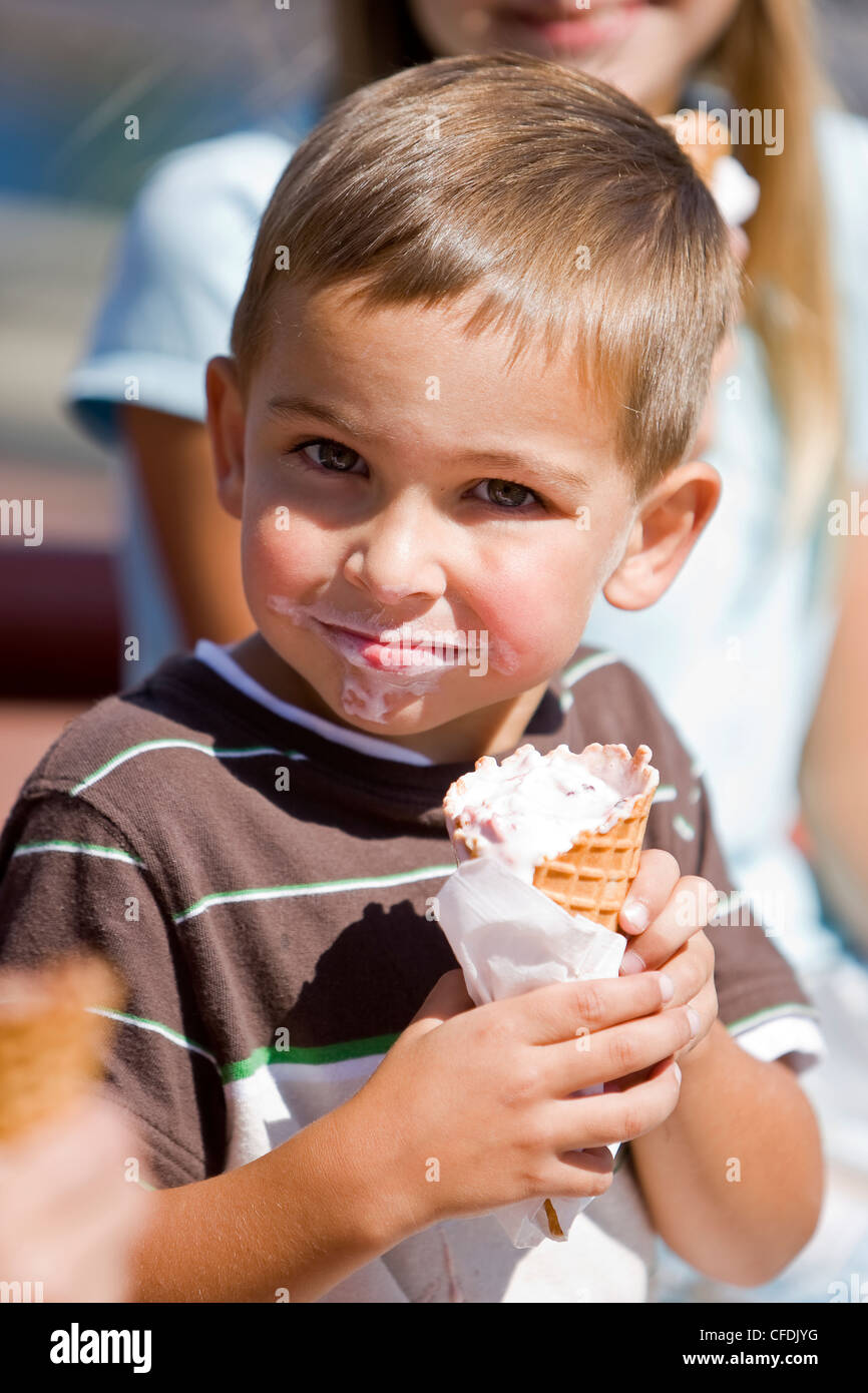 young boy faced covered ice cream poses informal Stock Photo - Alamy