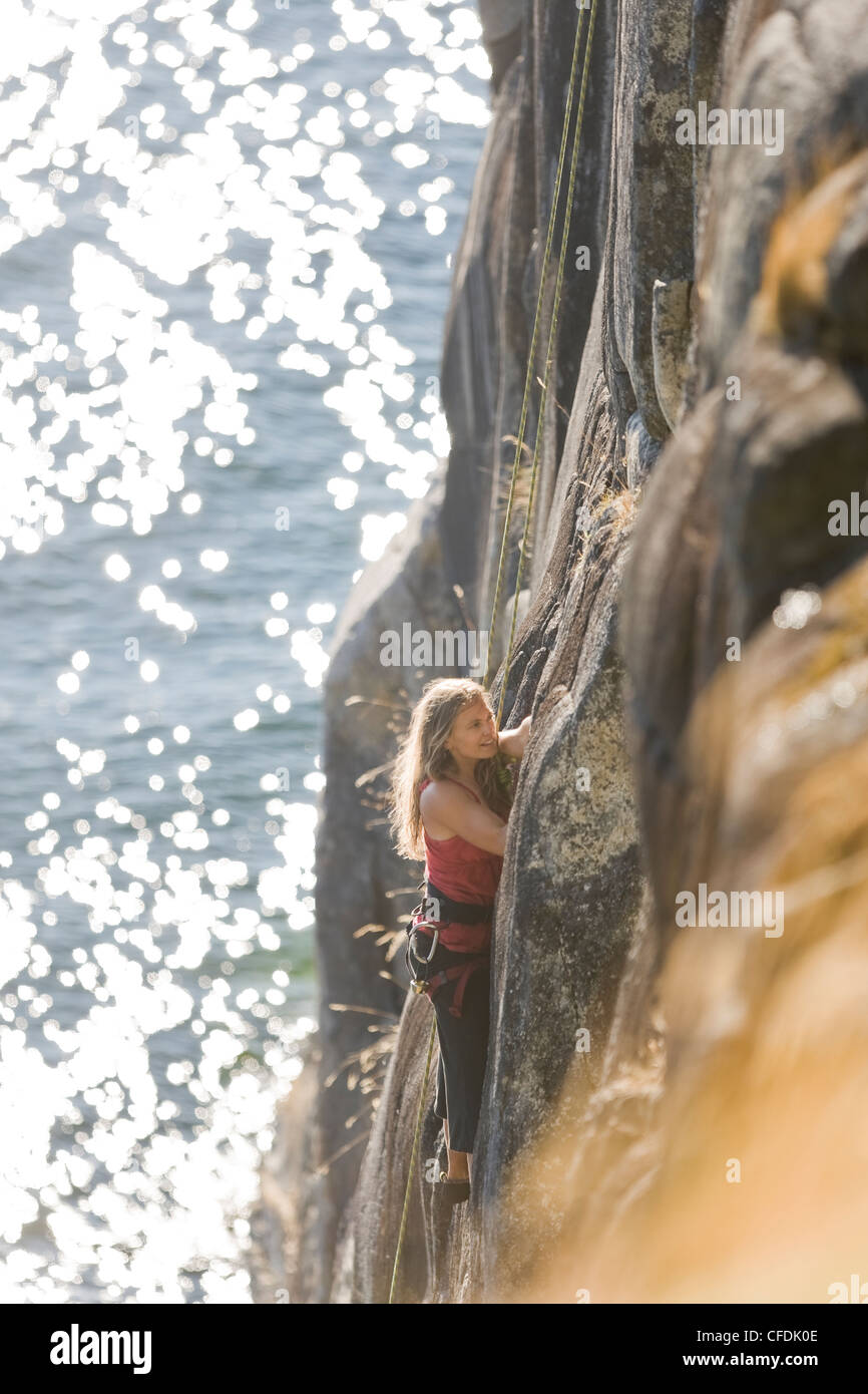 female climber makes way up one oceanside routes Stock Photo - Alamy