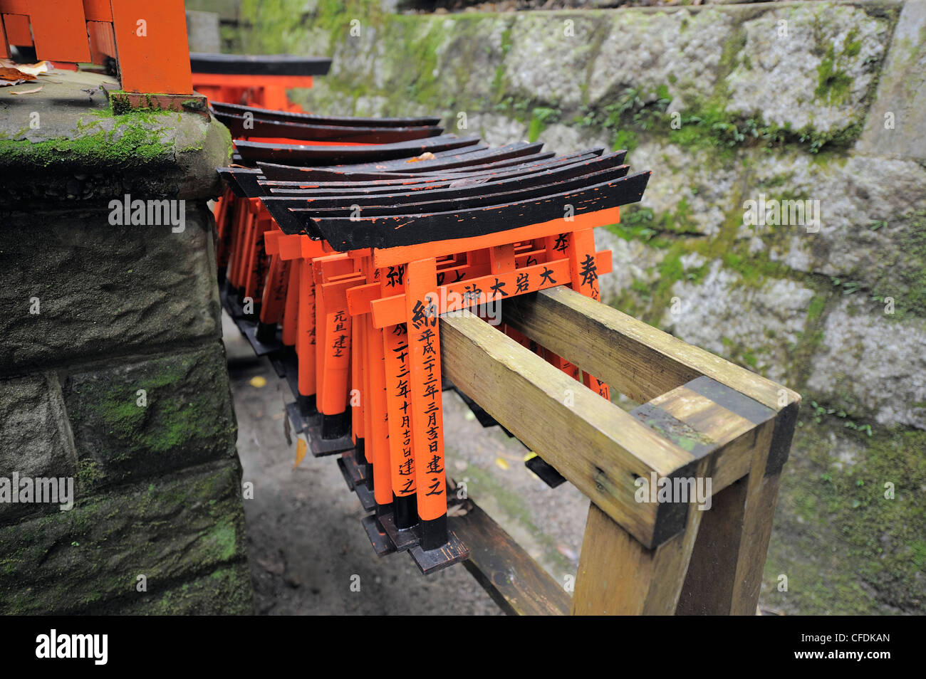 stack of miniature torii gates at Fushimi Inari Shrine, Kyoto, Japan ...