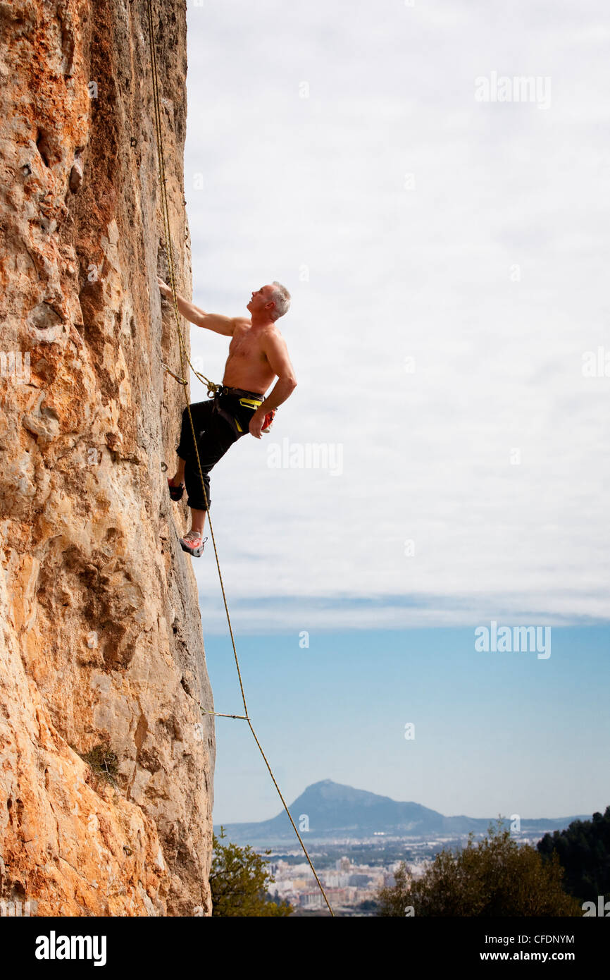 Man Rock Climbing at Gandia in Costa Blanca area of Spain Stock Photo ...