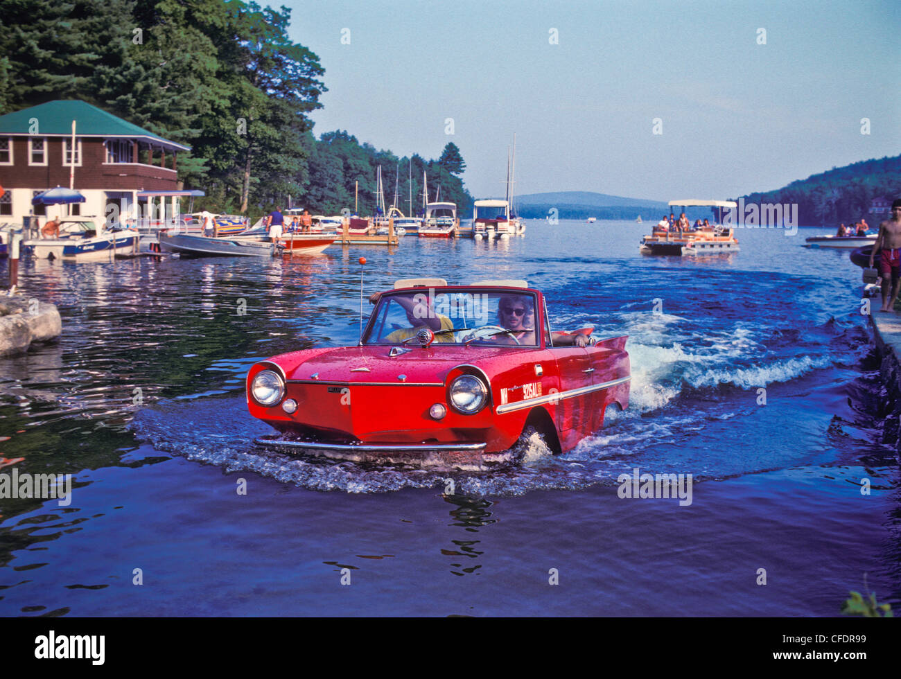 Water, boating activity during 4th of July antique boat parade on Lake ...