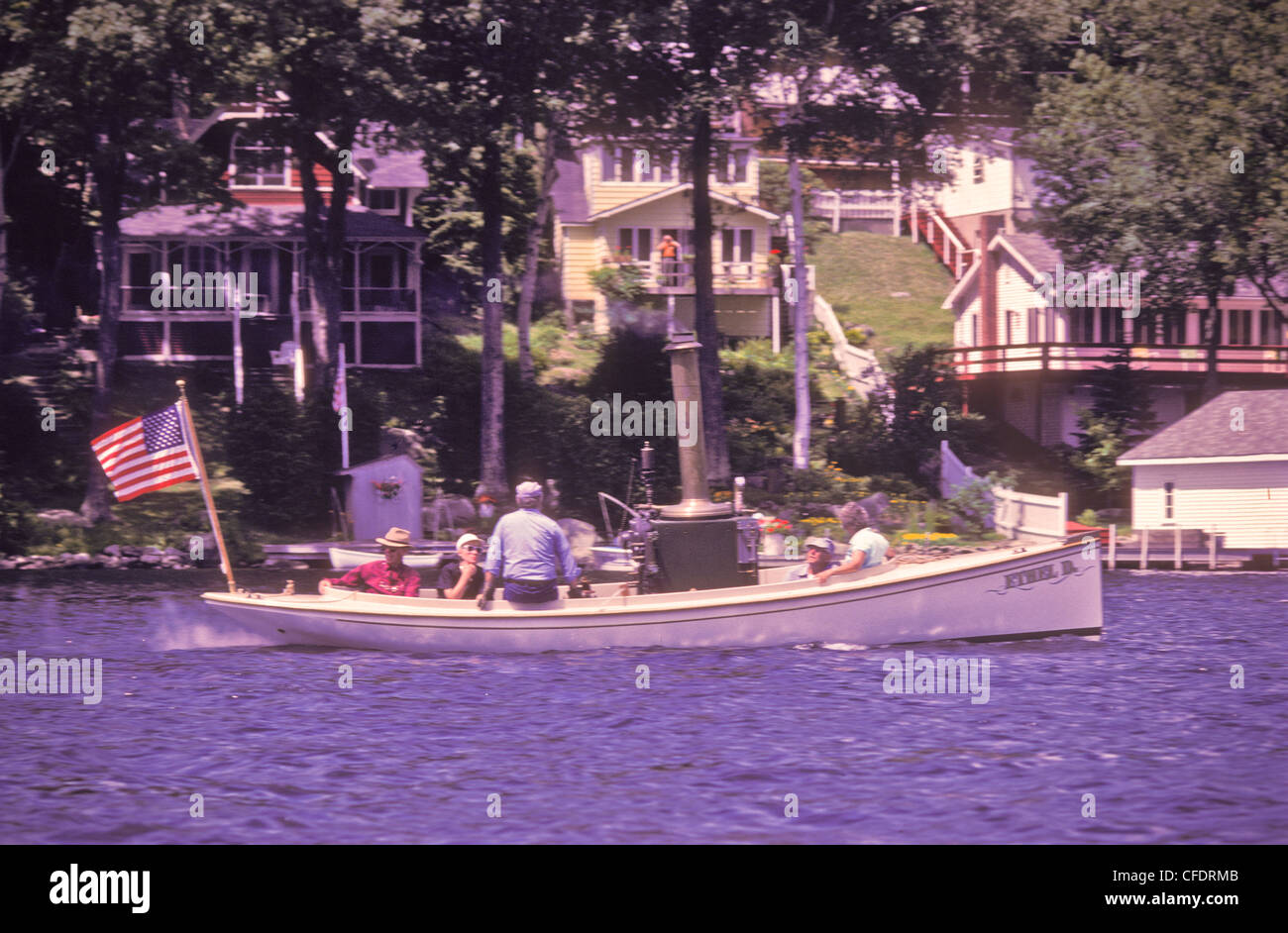 Water, boating activity during 4th of July antique boat parade on Lake ...