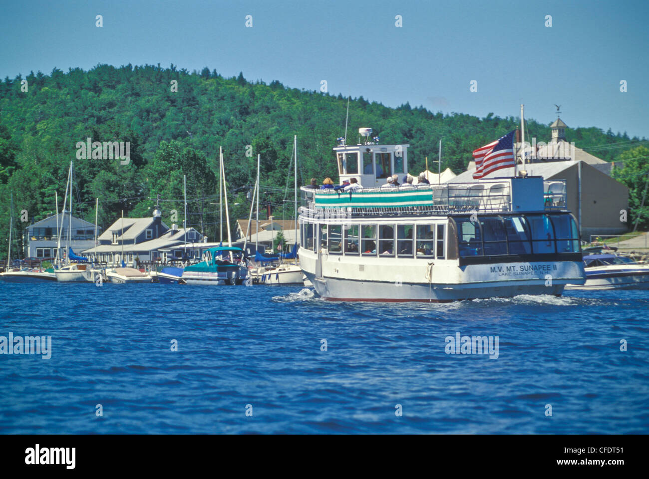 Water, boating activity during 4th of July antique boat parade on Lake ...