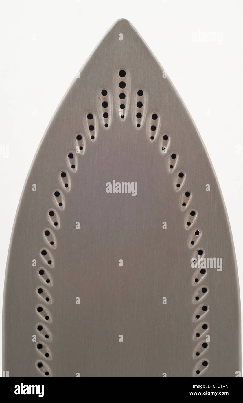 Bottom part of iron on white background Stock Photo - Alamy