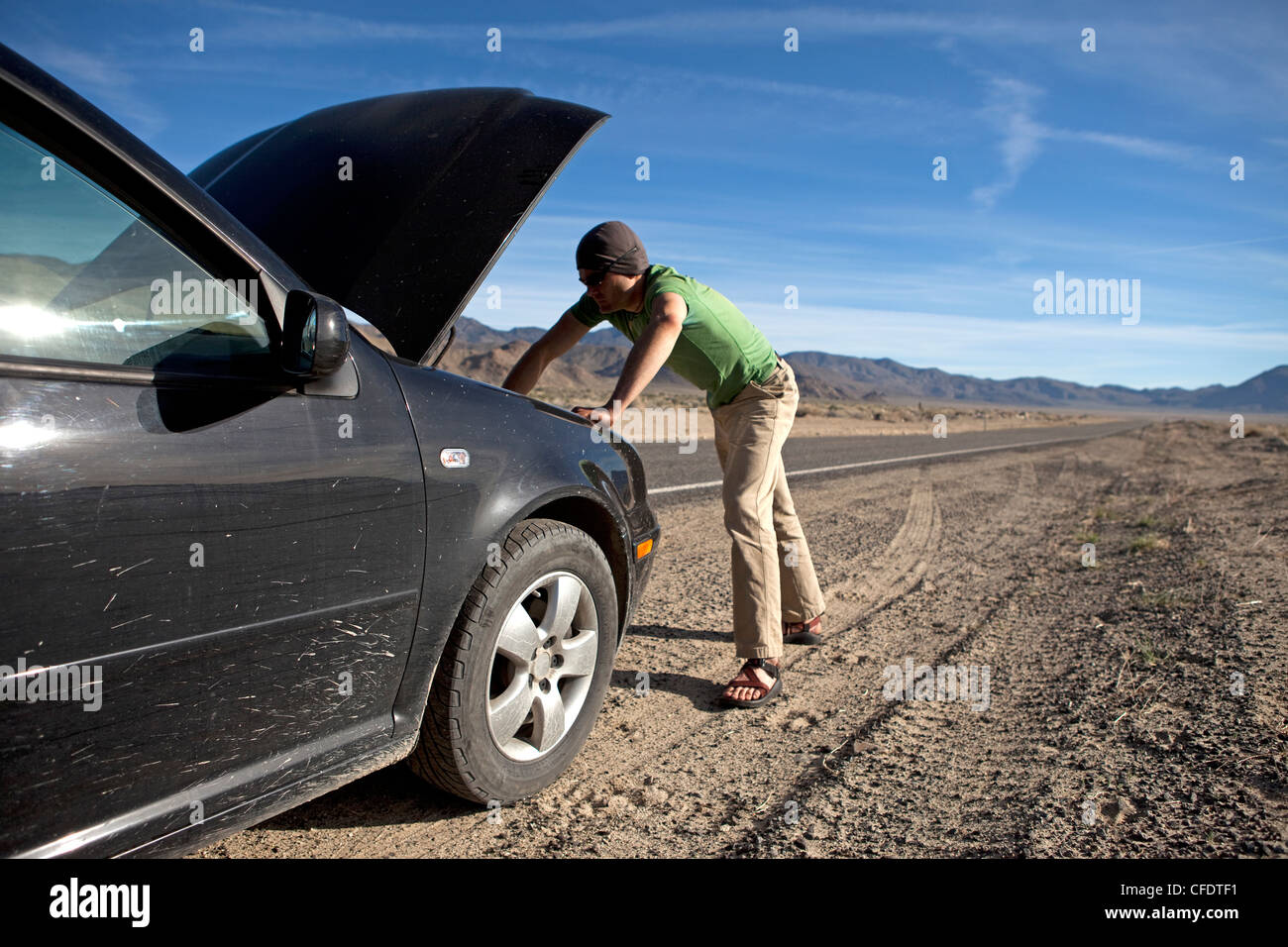 Man Standing Near A Broke Down Car Stock Photo Alamy man-standing-near-a-broke-down-car-stock-photo-alamy