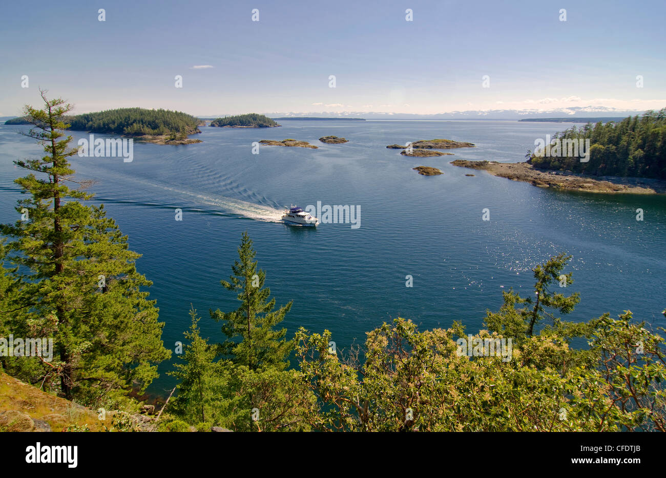 Boater enjoys cruise into Desolation Sound Marine Stock Photo - Alamy