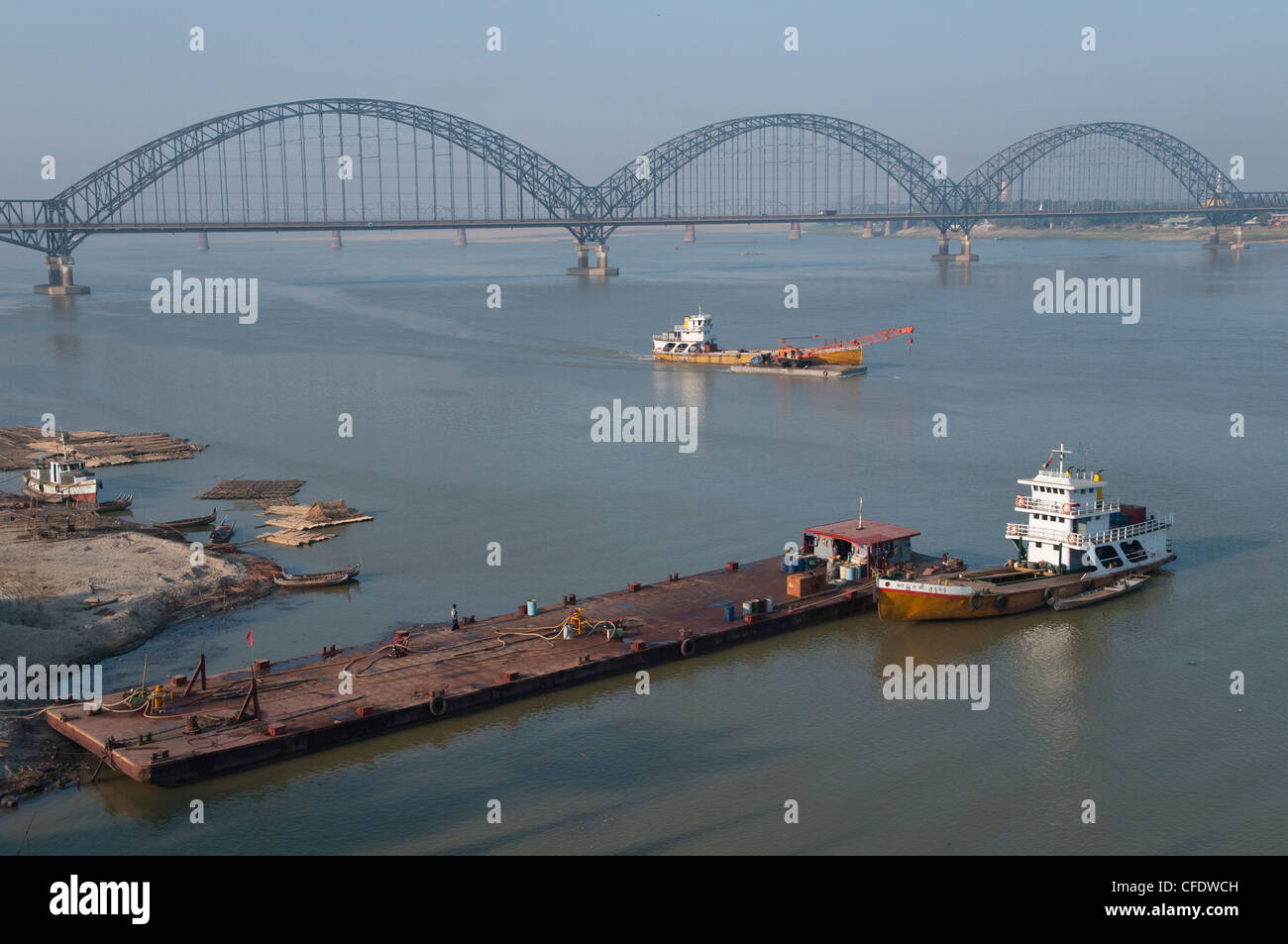Boat activity on the Irrawady River with Yadanabon bridge, Sagaing ...