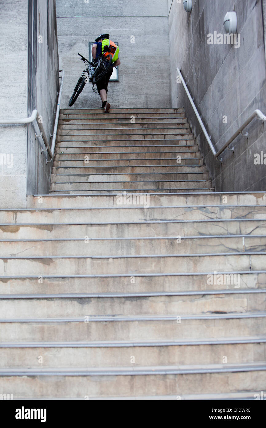 Cycling up steps hi-res stock photography and images - Alamy
