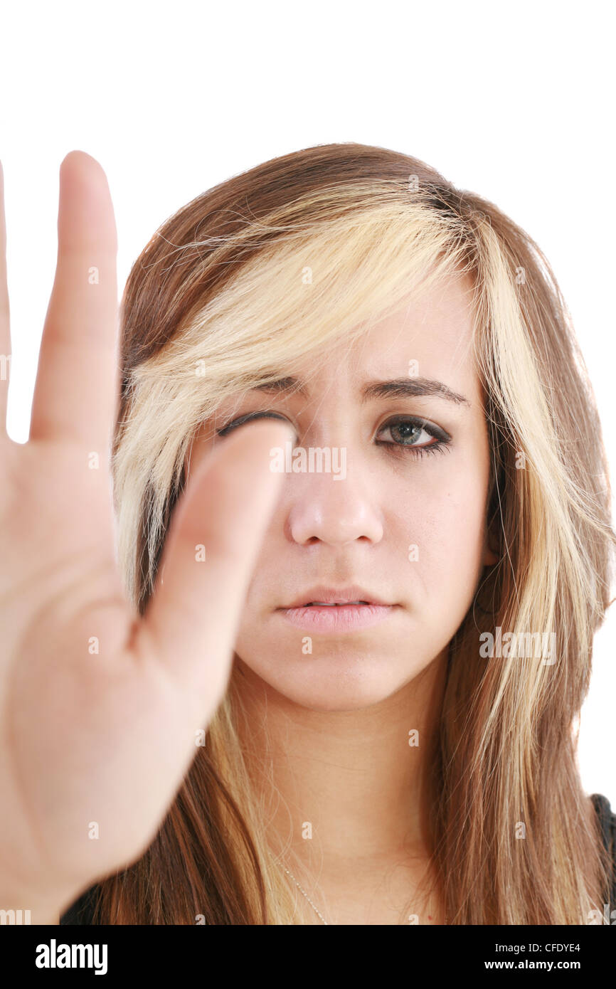 Confident woman stop gesture sing with hand Stock Photo - Alamy