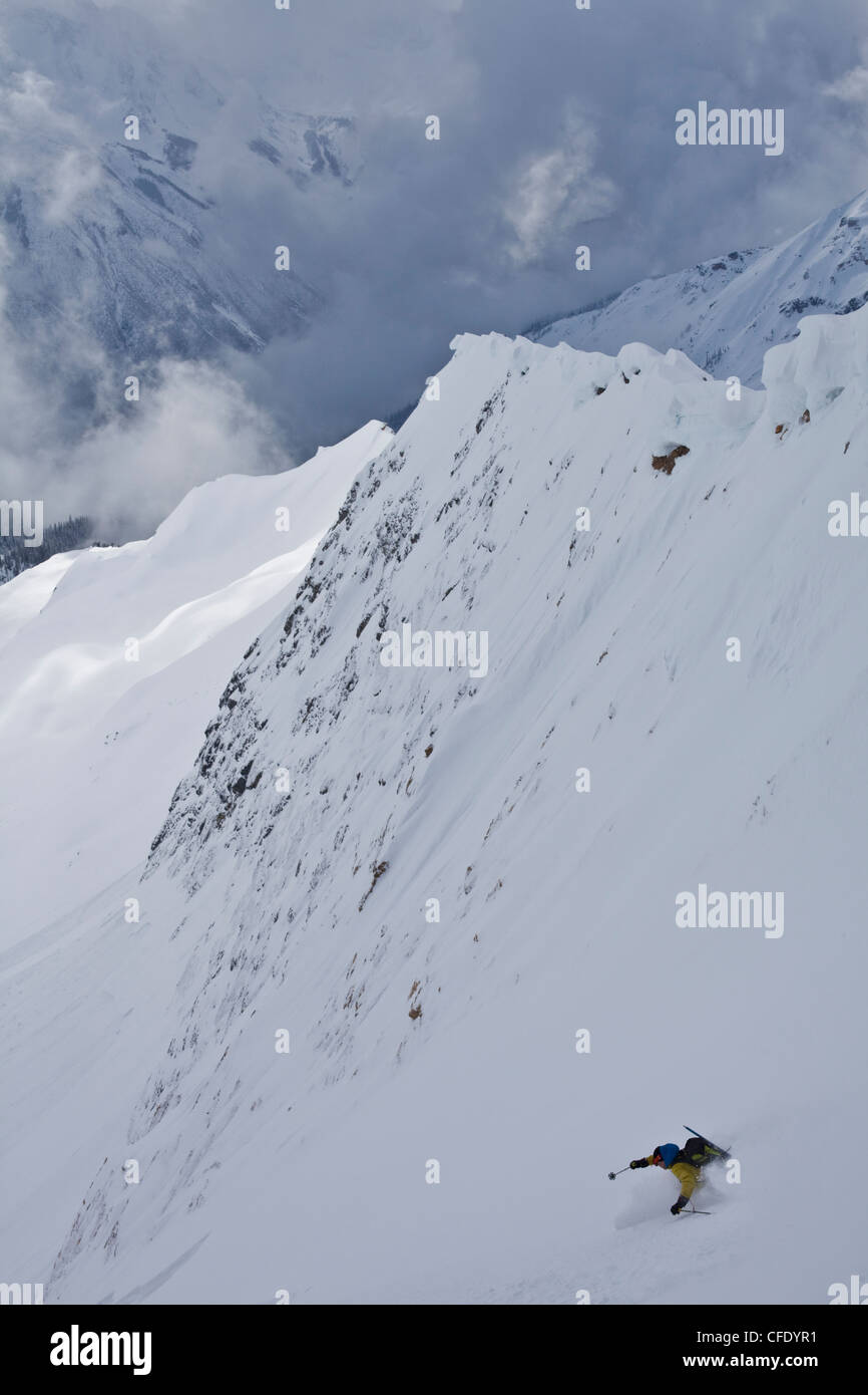 Skier Descending A Steep Slope High Resolution Stock Photography and ...