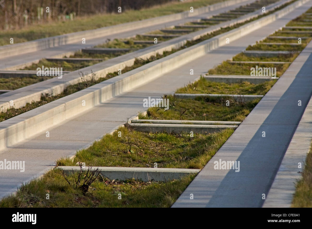 Concrete rails for rubber wheels Stock Photo - Alamy