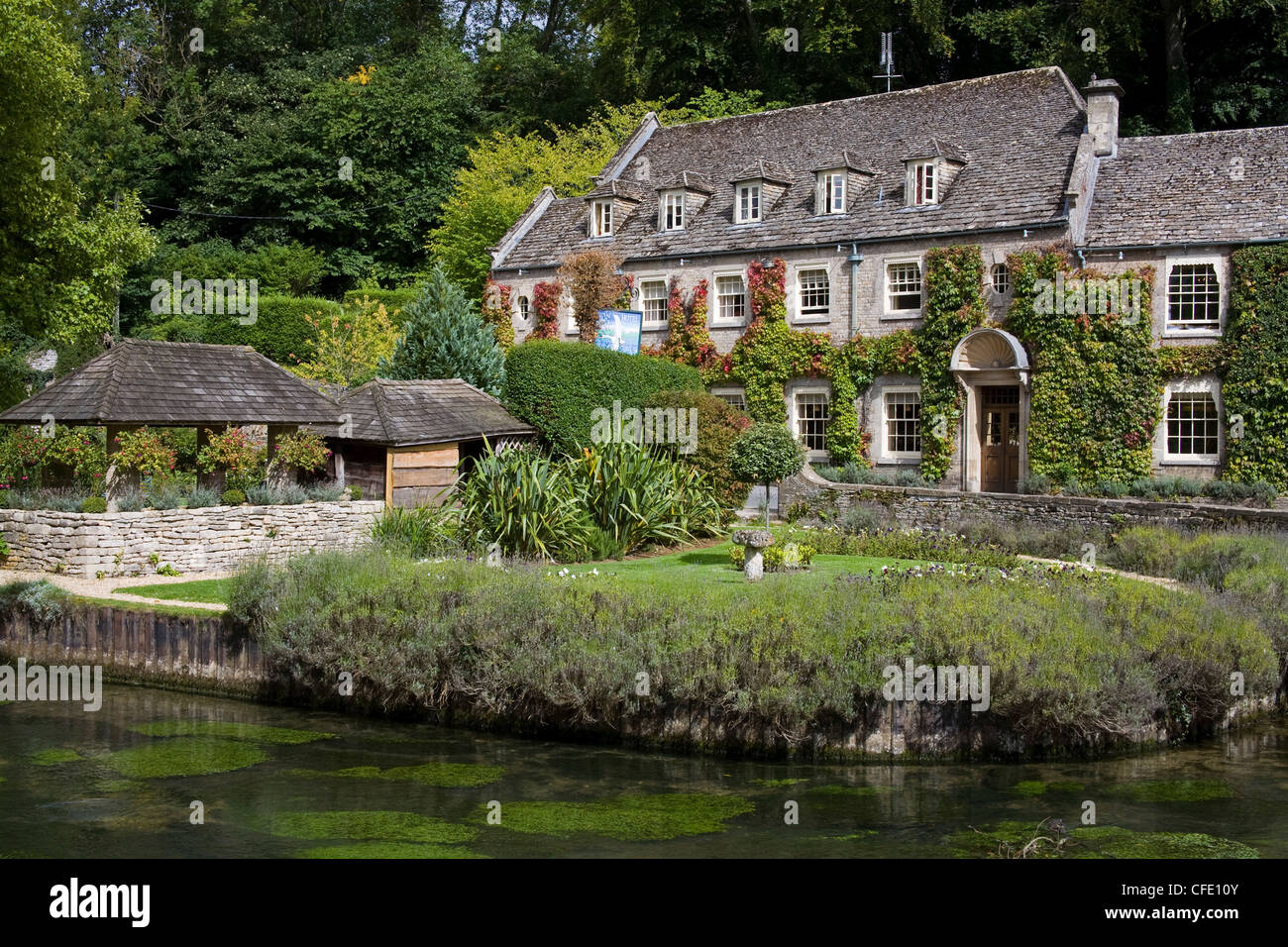 Swan Hotel and River Coln, Bibury Village, Gloucestershire, Cotswolds ...