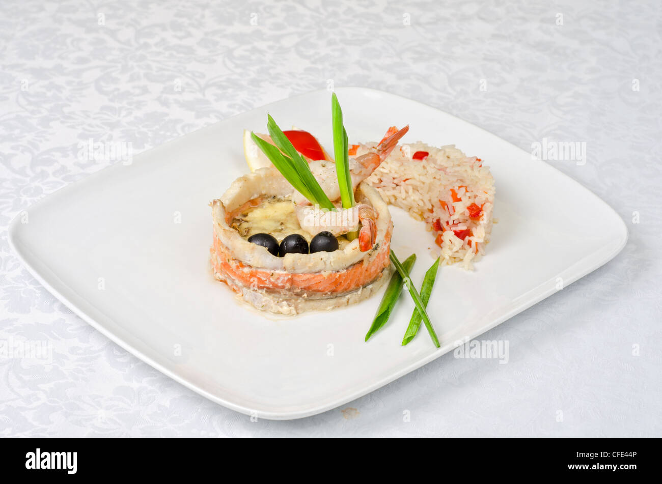 tasty prepared fish with rice and vegetables Stock Photo - Alamy