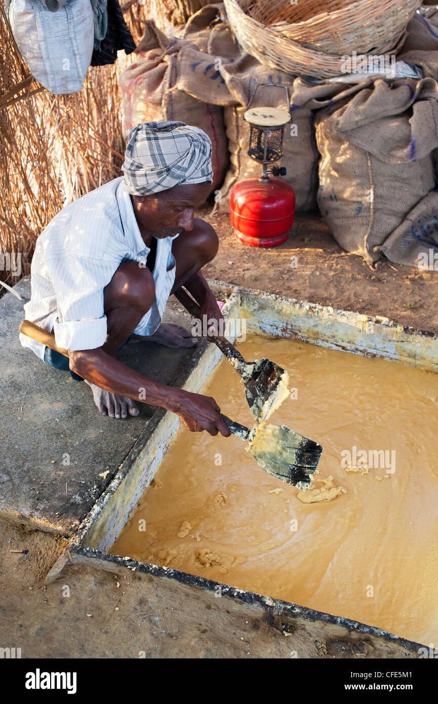 Jaggery production in the rural south Indian countryside. Raw unrefined ...
