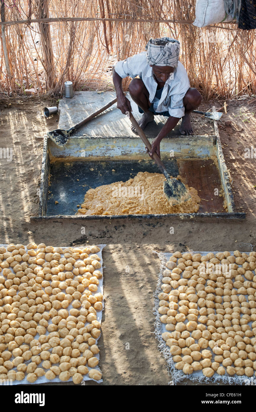 Jaggery production in the rural south Indian countryside. Rolling Raw ...