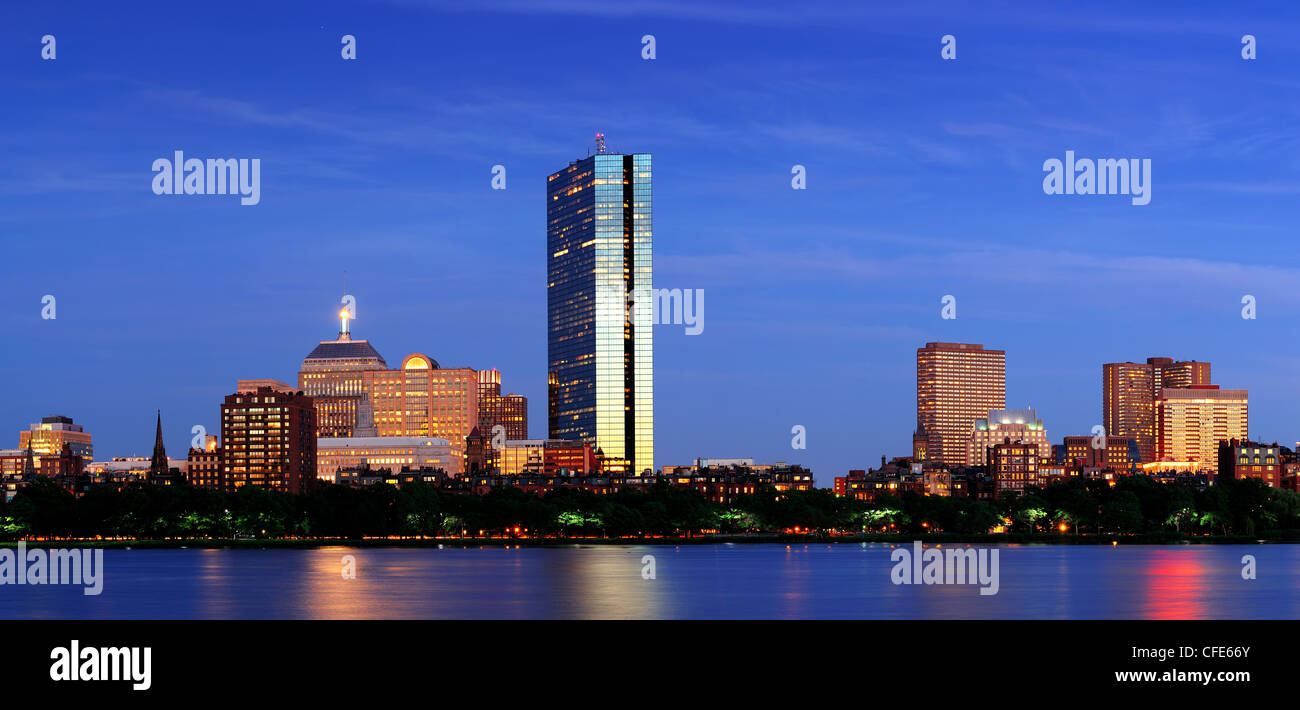 Boston Charles River at dusk with urban city skyline and light ...